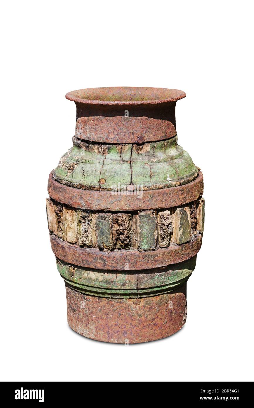 Upright old and weathered wheel hub of an ancient horse carriage as a ...