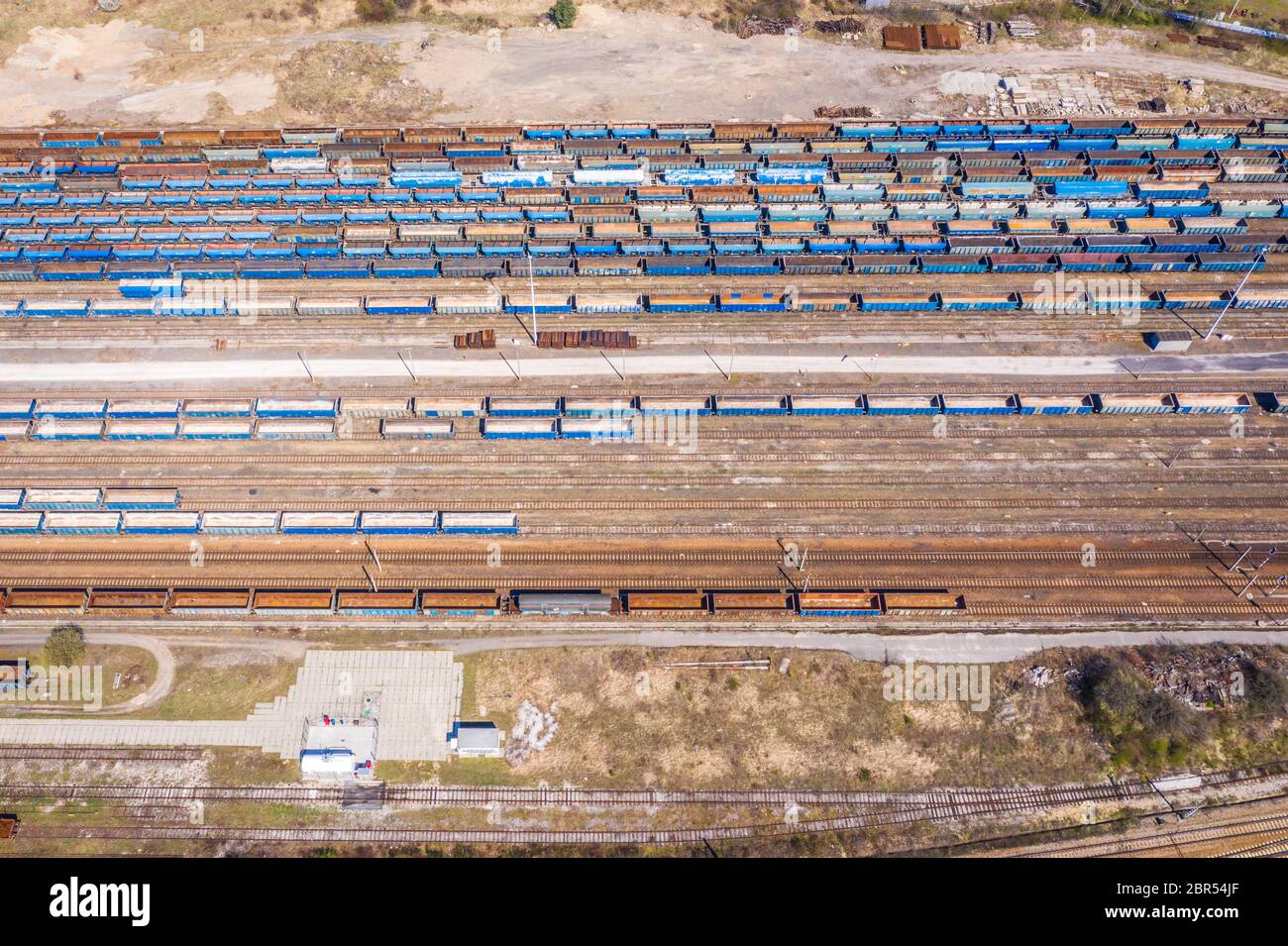 Cargo trains. Aerial view of colorful freight trains on the railway ...