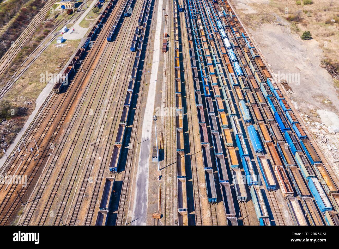 Cargo trains. Aerial view of colorful freight trains on the railway ...