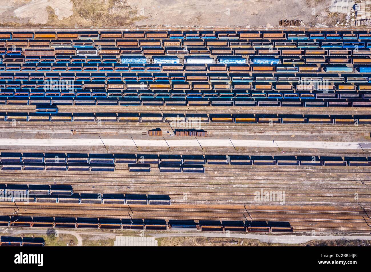 Cargo trains. Aerial view of colorful freight trains on the railway ...
