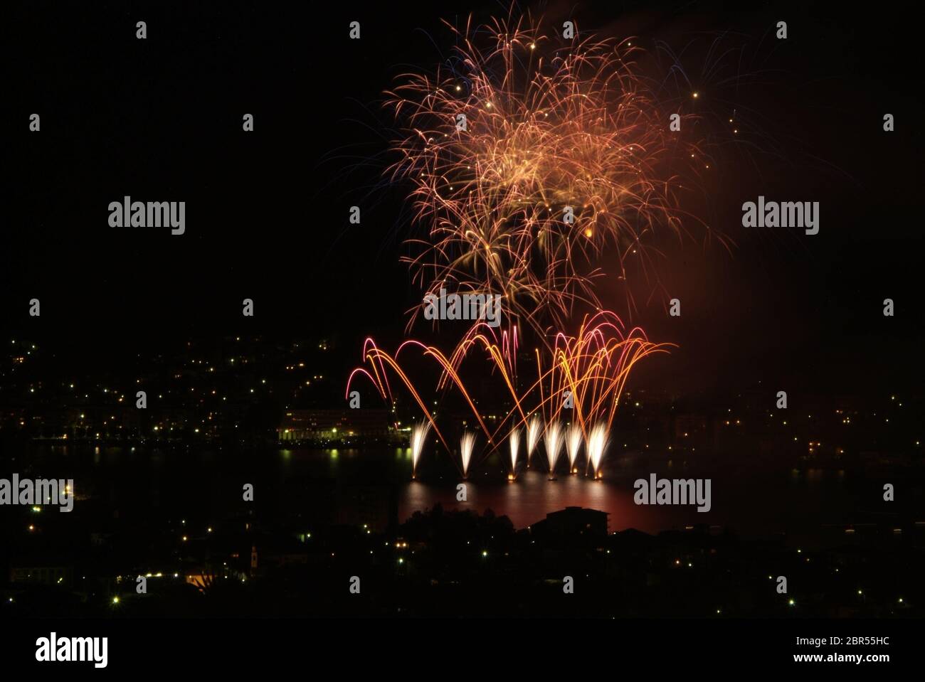Nice and colorful fireworks in black night Stock Photo - Alamy