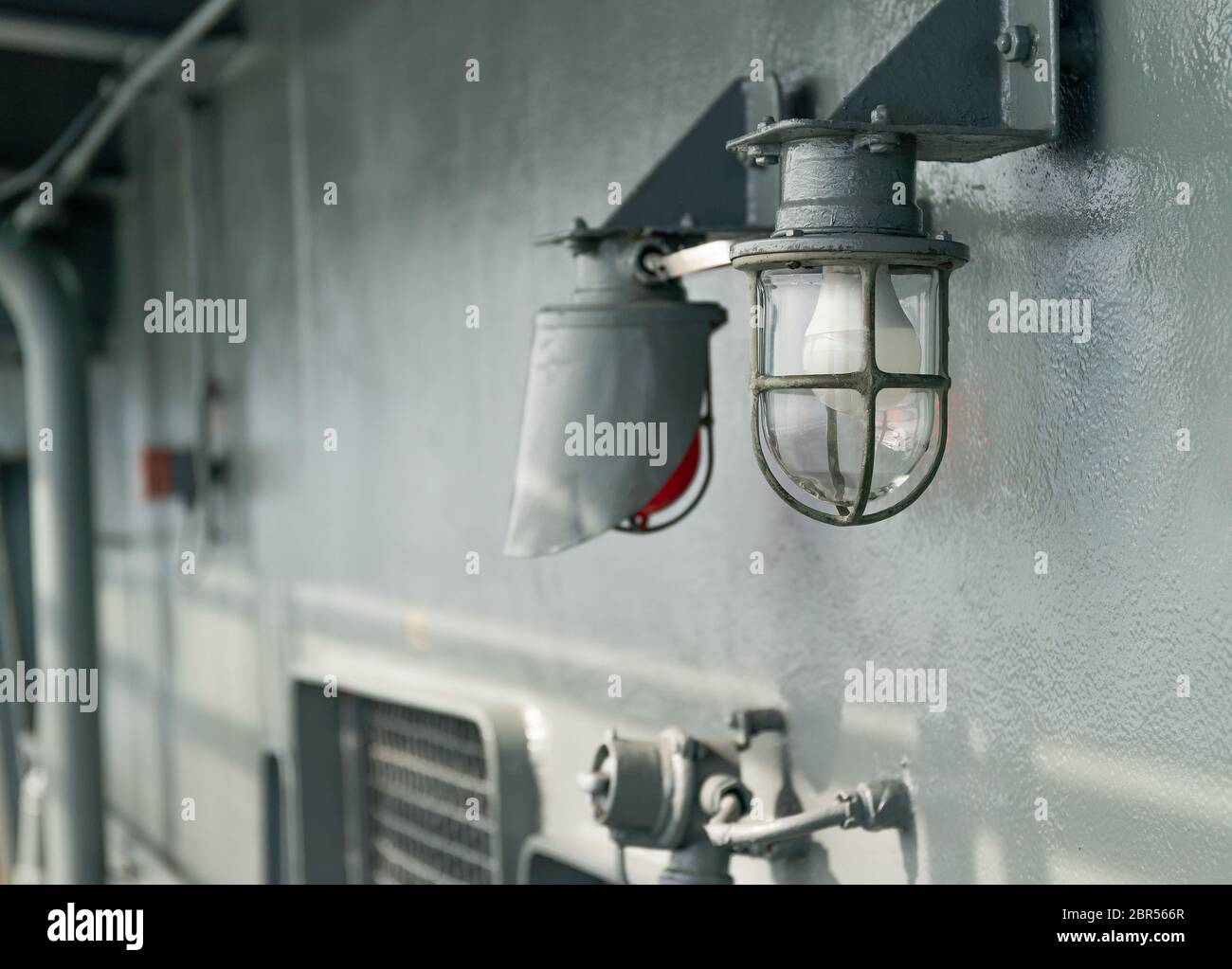 Deck lamp on ship with metal frame fixed in protective cage Stock Photo ...