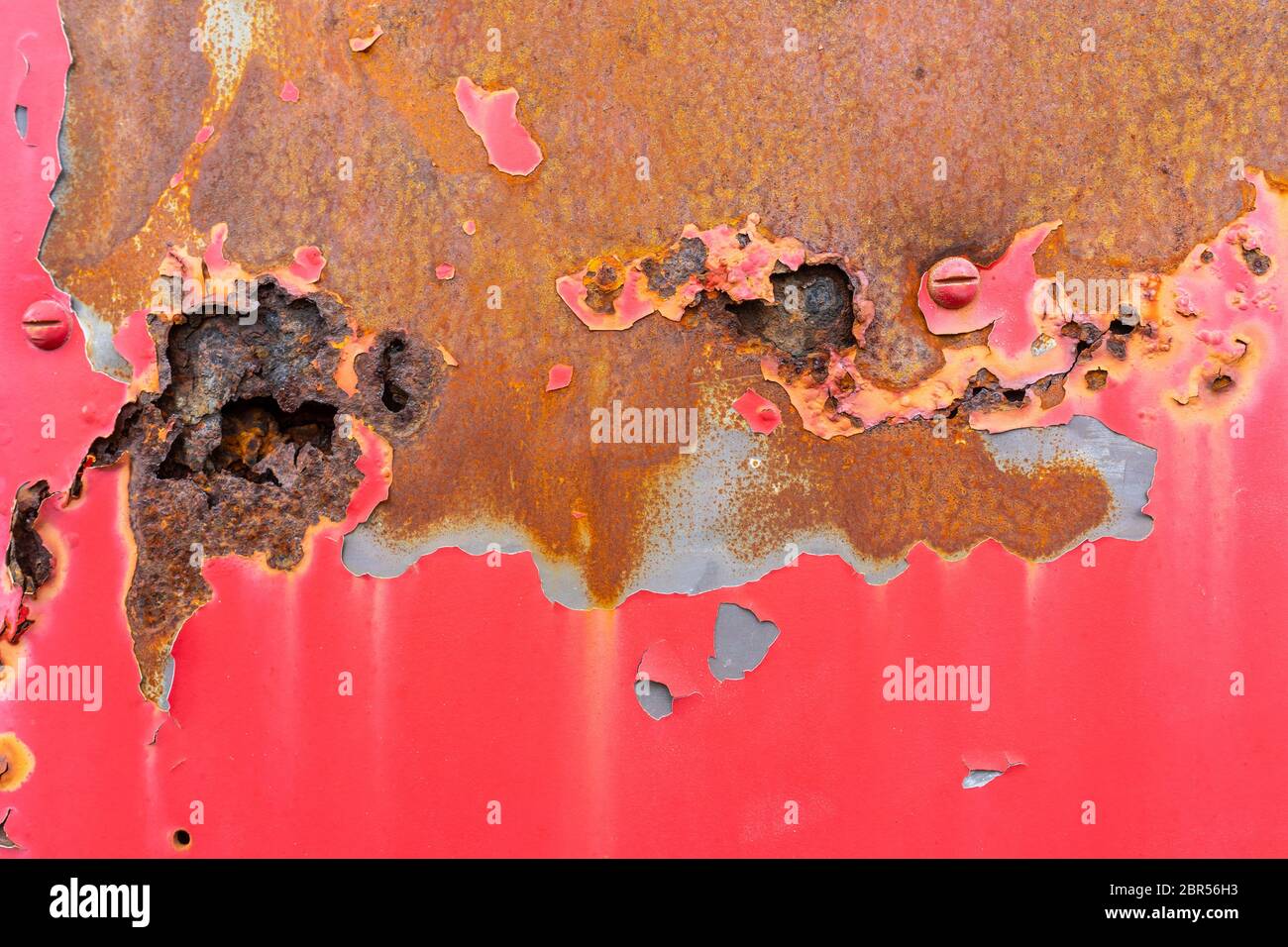 Rusty metal surface with traces of aged and cracked red paint Stock ...
