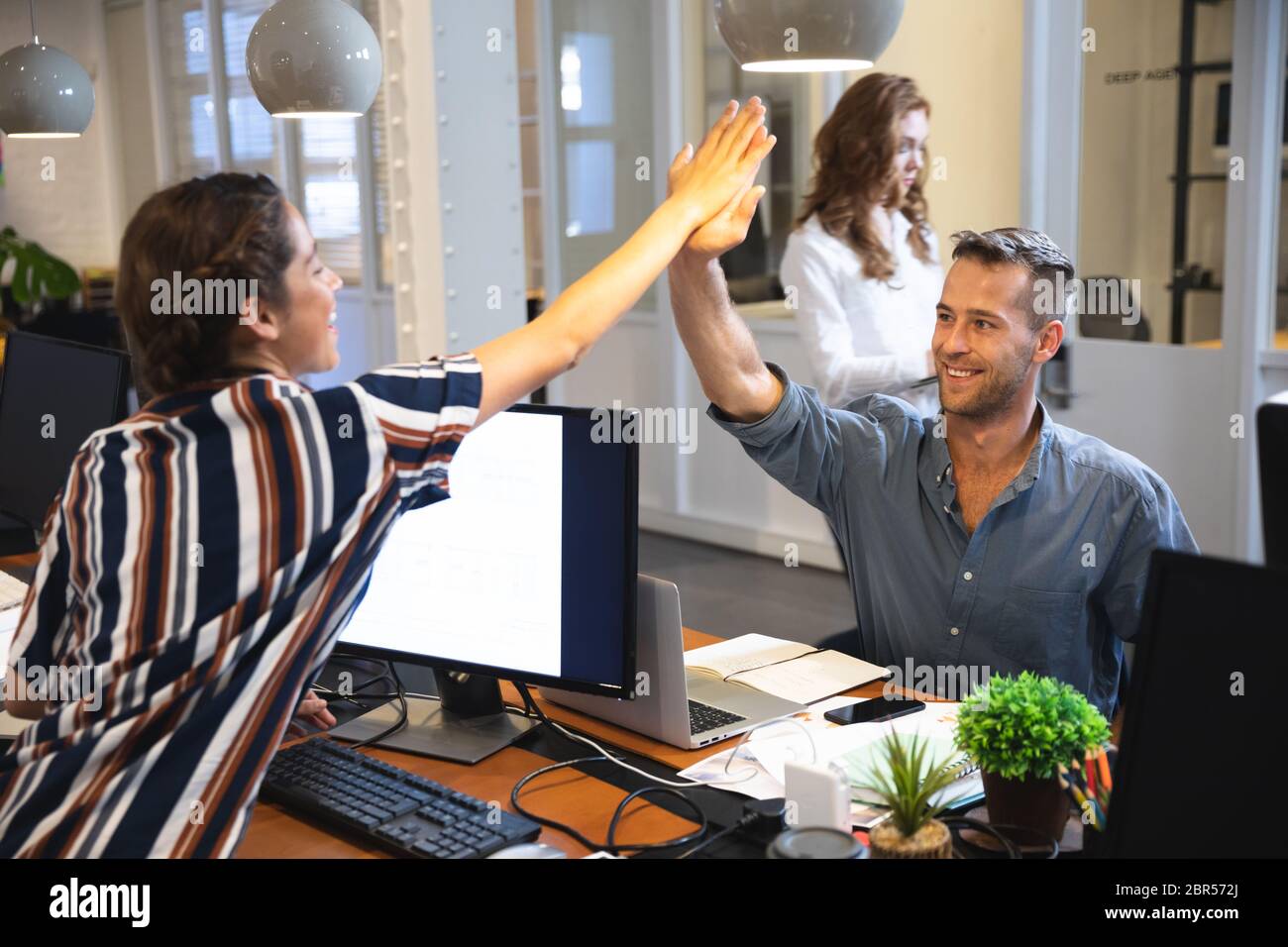 Creative office people celebrating hi-res stock photography and images ...