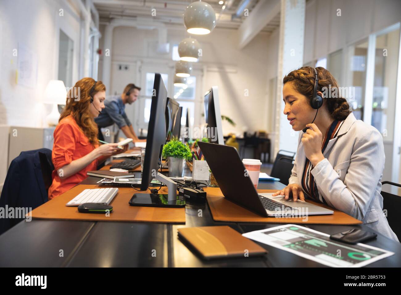 Business creative people working in a casual modern office Stock Photo ...