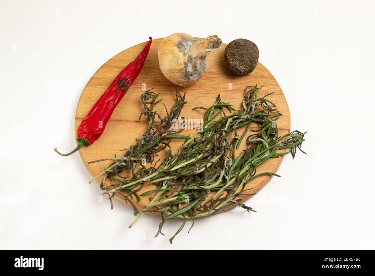 Onion with mold, red pepper with rot and dried beets and rosemary ...
