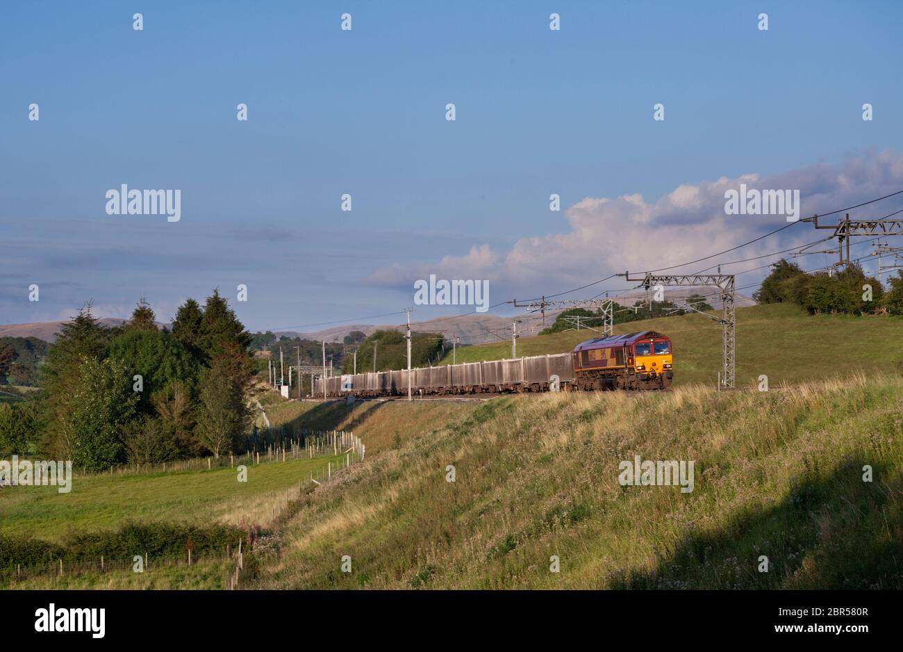 DB Cargo class 66 locomotive in EWS livery passing Lambrigg (north of ...