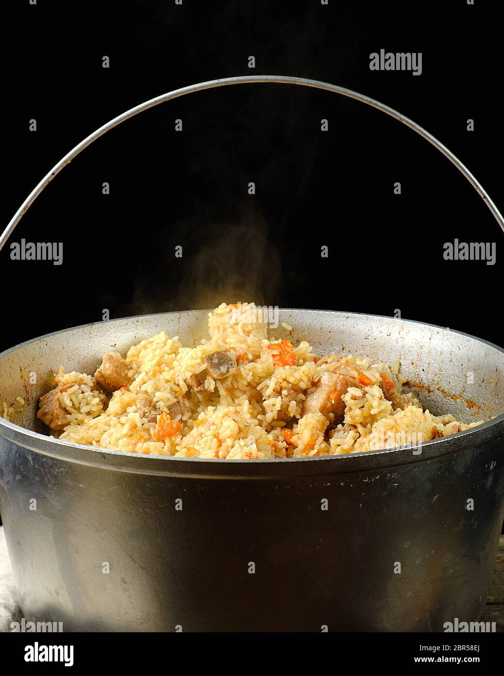 Pilaf is an oriental dish of boiled rice with fat and slices of meat ...