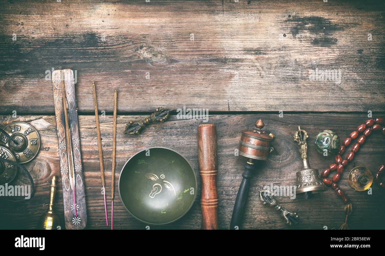 Copper singing bowl, prayer beads, prayer drum and other Tibetan ...