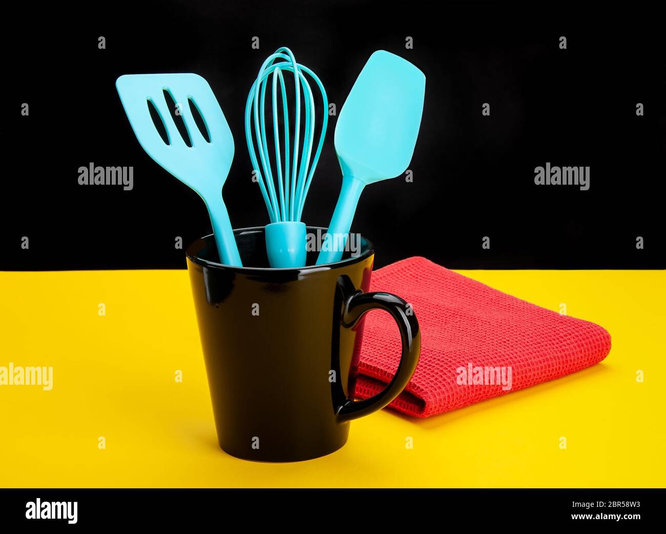 Colorful mini cooking utensils blue plastic Stock Photo - Alamy