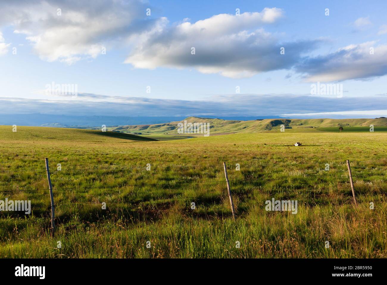 Mountains farmlands scenic plateau landscape late afternoon Stock Photo ...