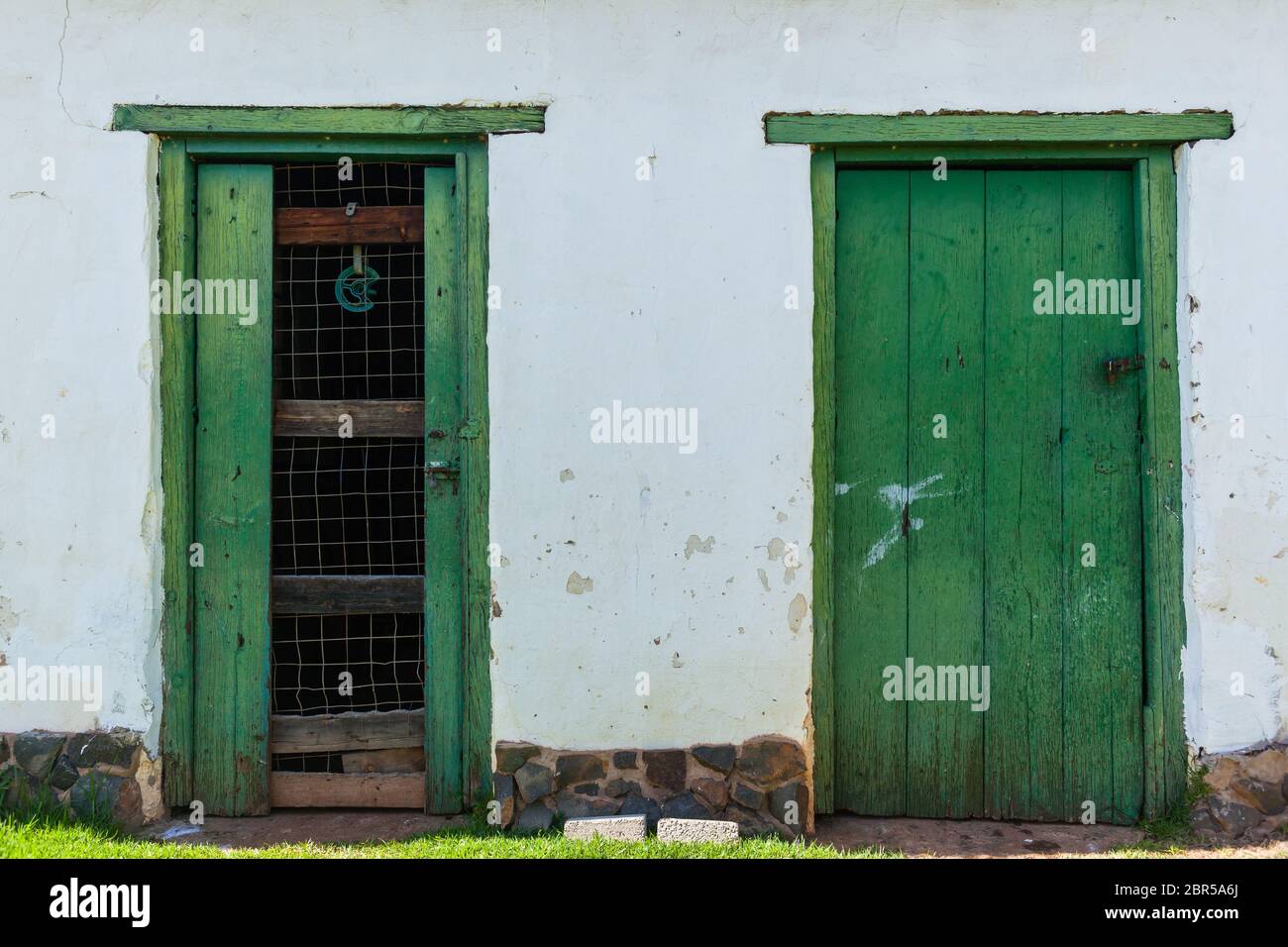 Vintage door wood frames in farm wall outside storeroom structure Stock ...