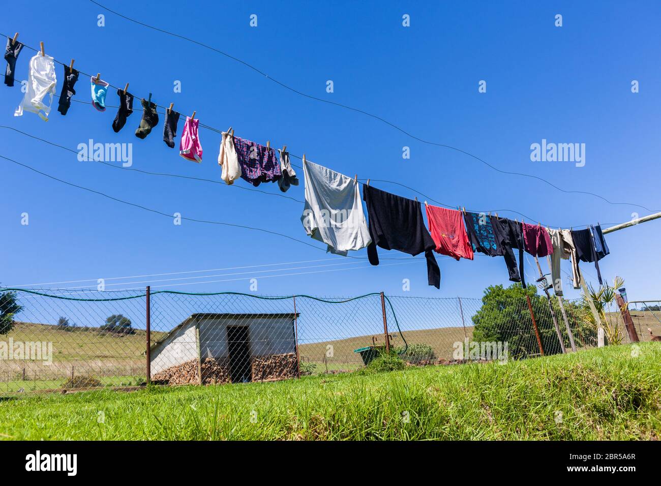 Farm washing clothes drying lines rural lifestyle landscape Stock Photo ...