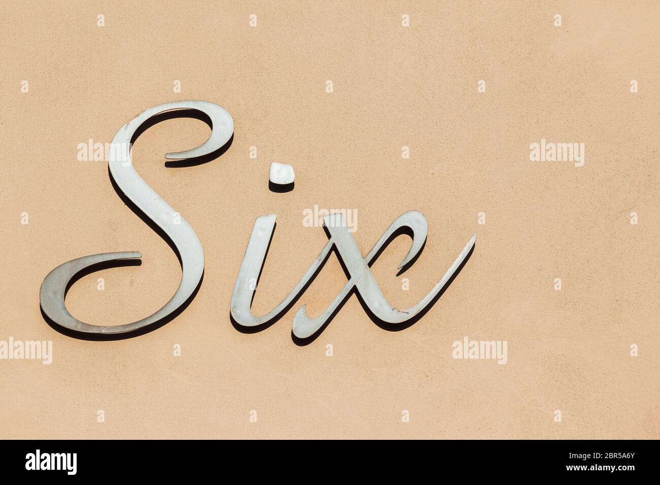 Number six sign metal plate decor black and white Stock Photo - Alamy