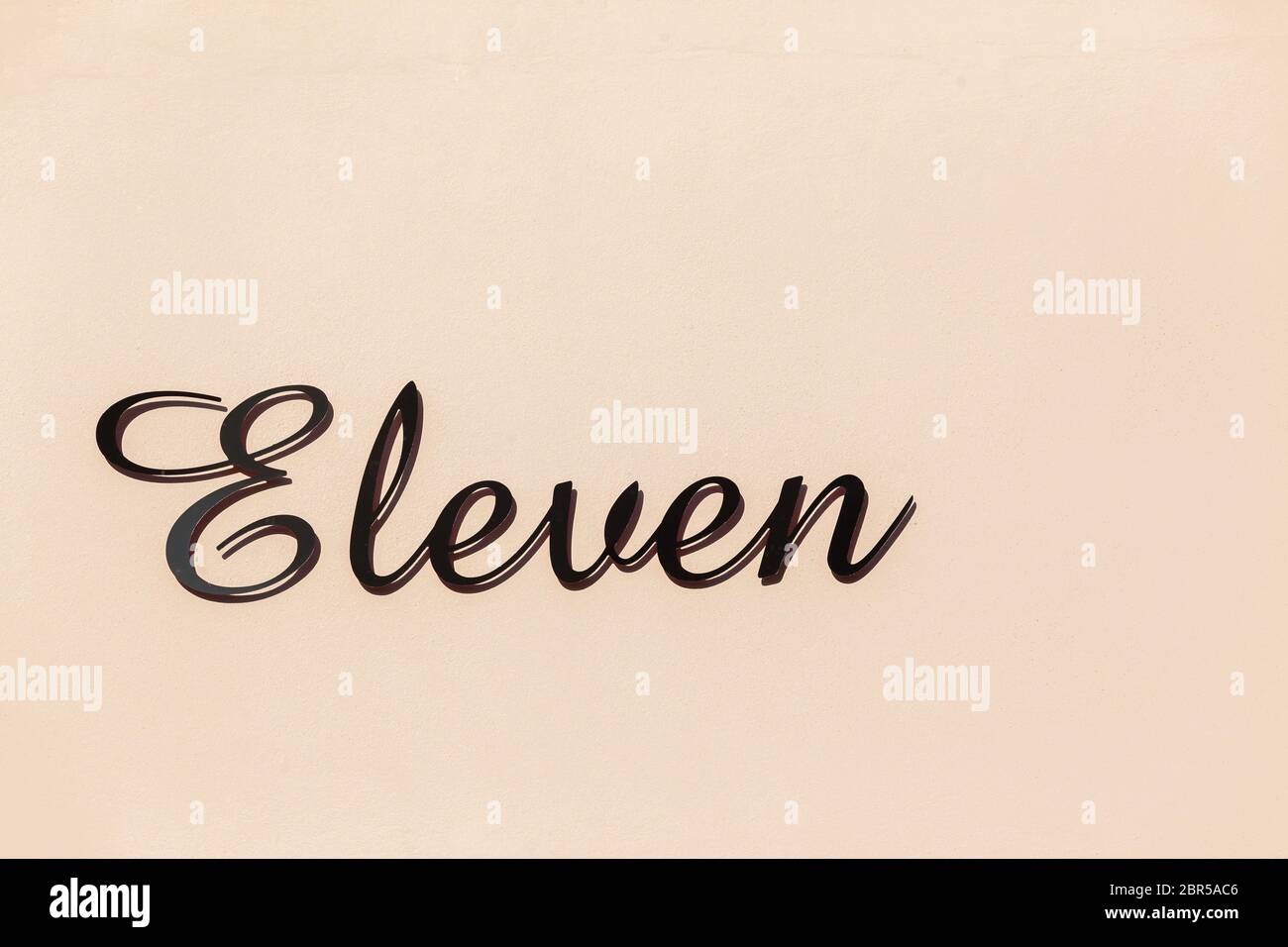 Number Eleven sign metal plate decor black and white Stock Photo - Alamy