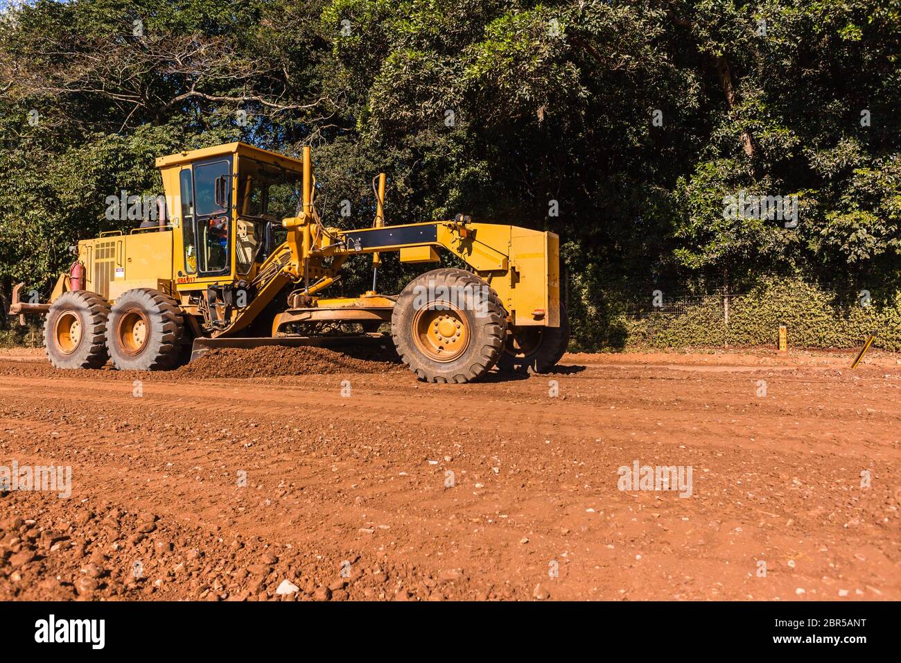 Grader industrial machine on construction of new roads Stock Photo - Alamy