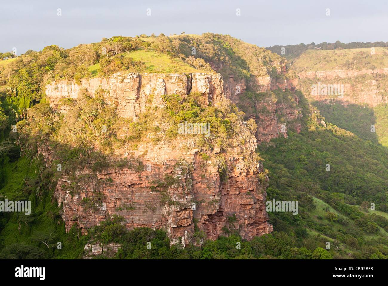 Wilderness hiking valley between rocky cliffs Stock Photo - Alamy