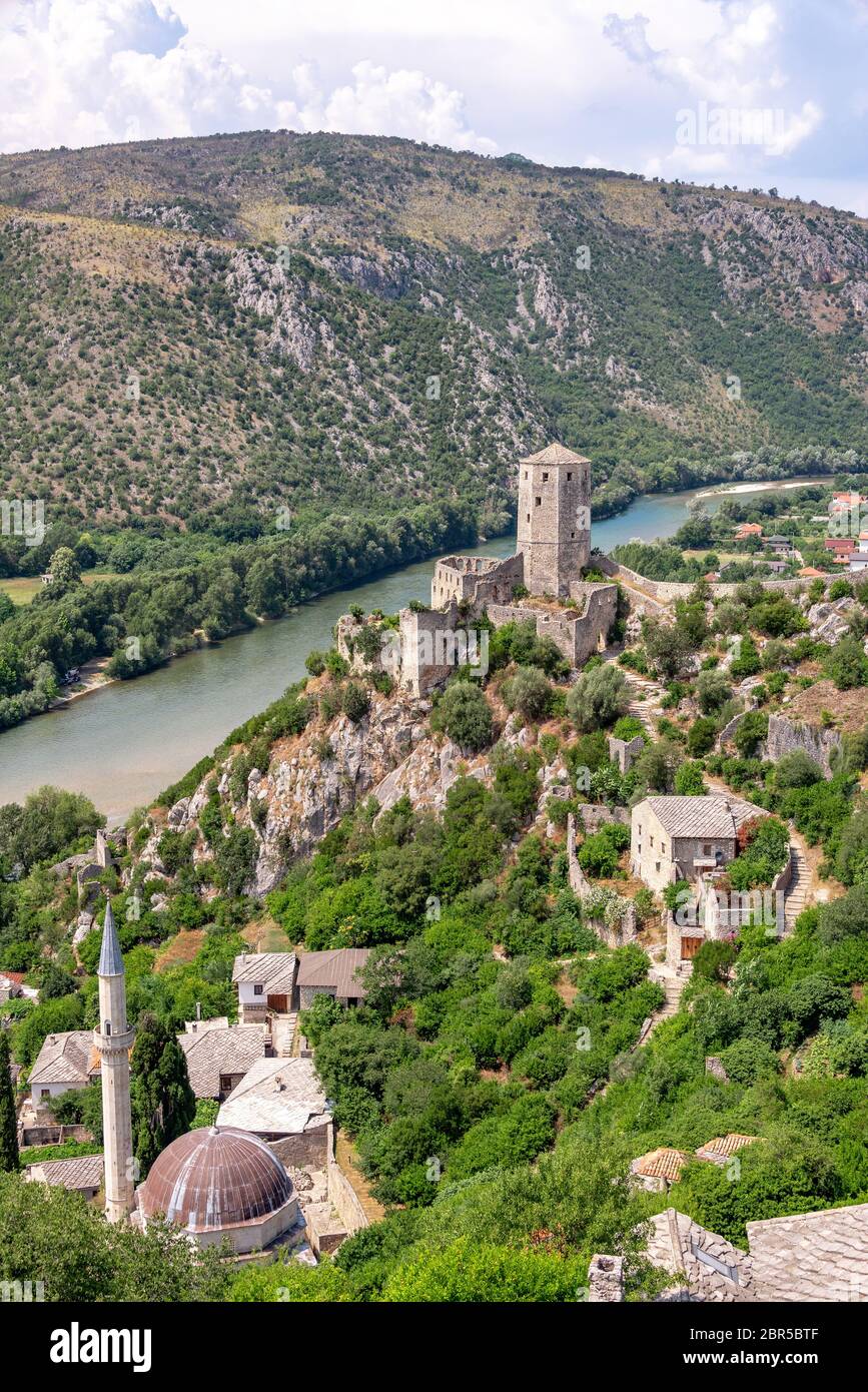 Castle and mosque in the historic village of Pocitelj, Bosnia Stock ...