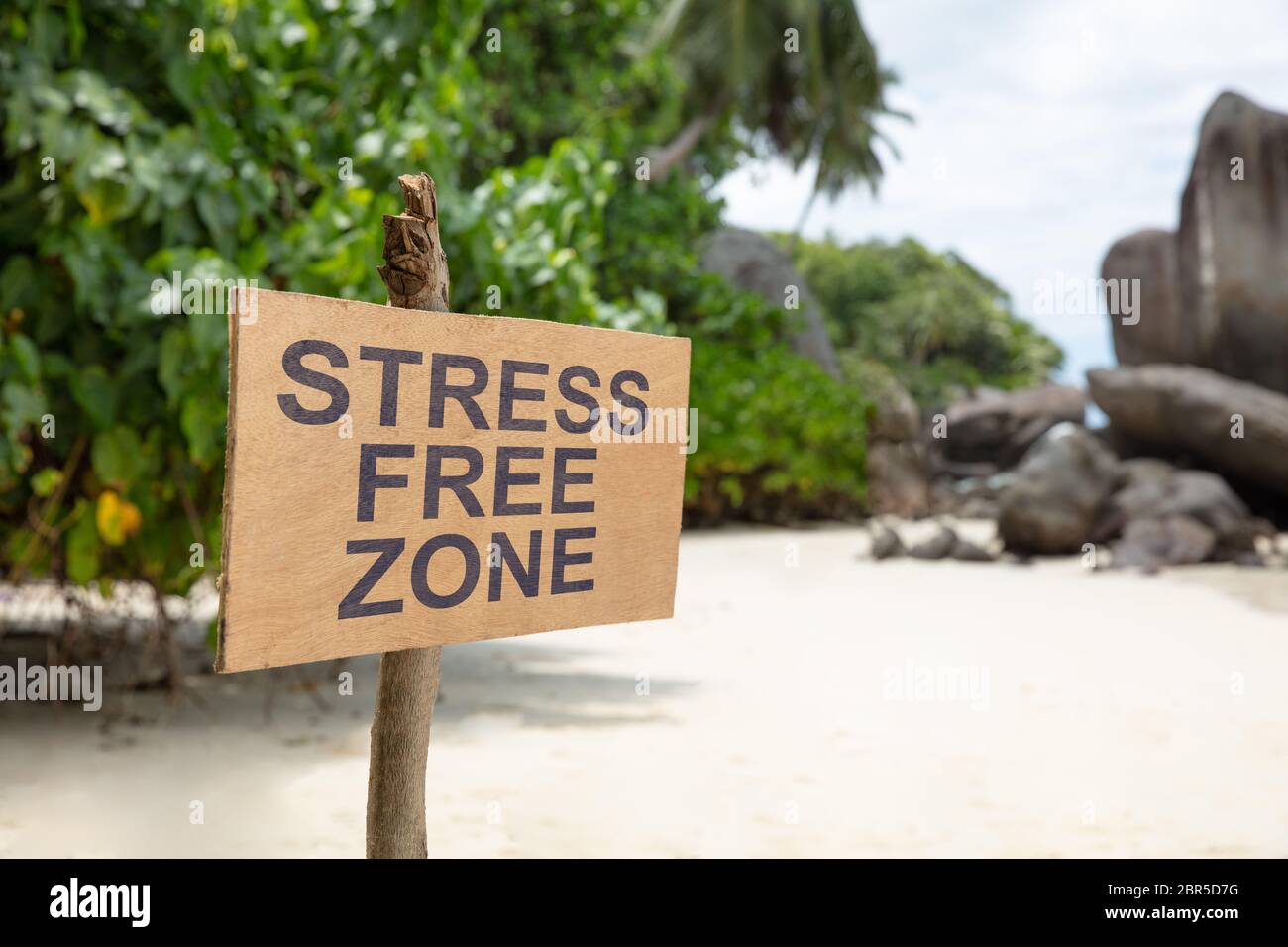 Street Free Zone Wooden Sign On The Beach Stock Photo - Alamy
