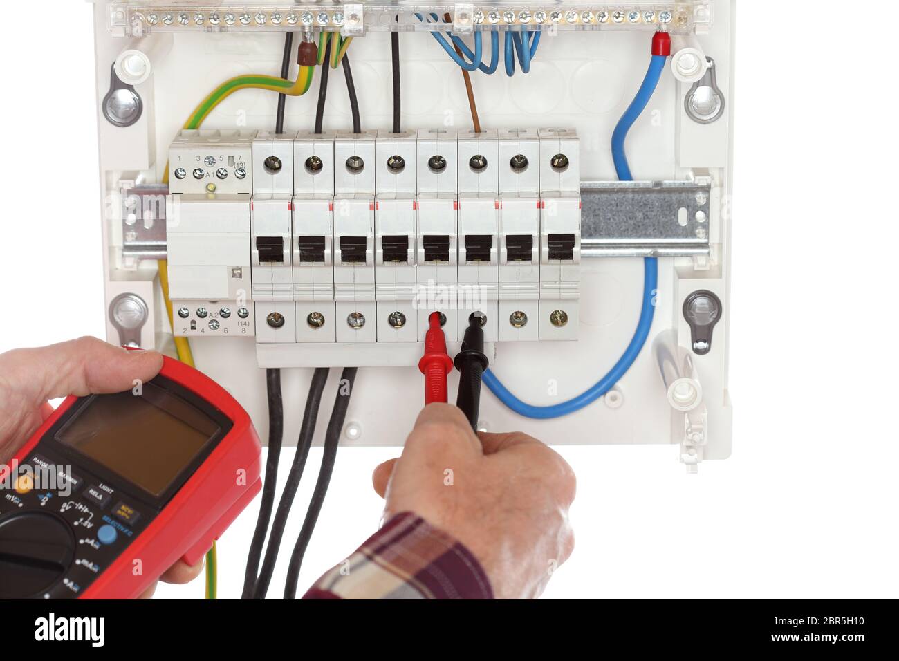 electrician is testing electrical devices with multimeter Stock Photo ...