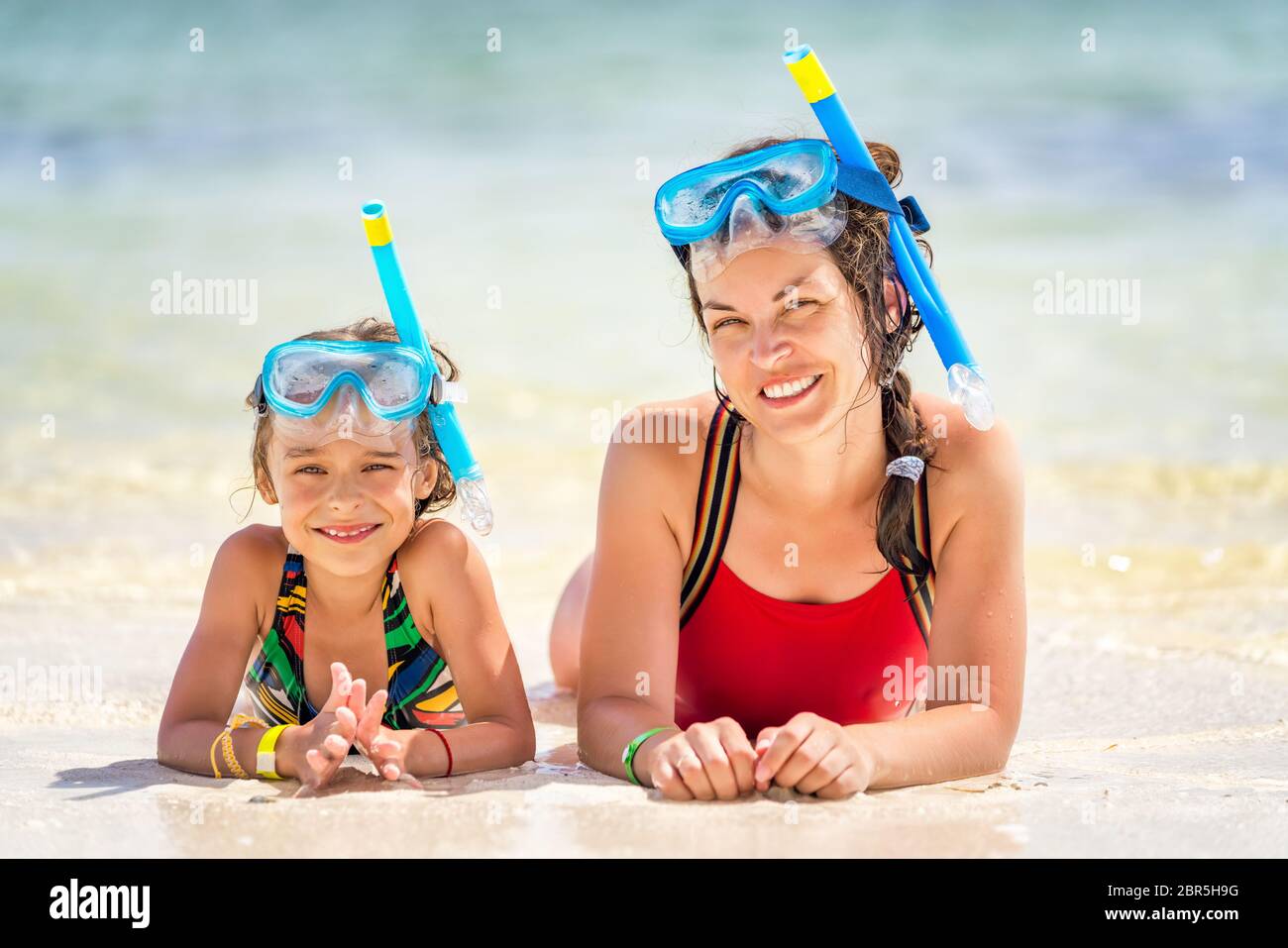 Mother daughter snorkeling in sea hi-res stock photography and images - Alamy