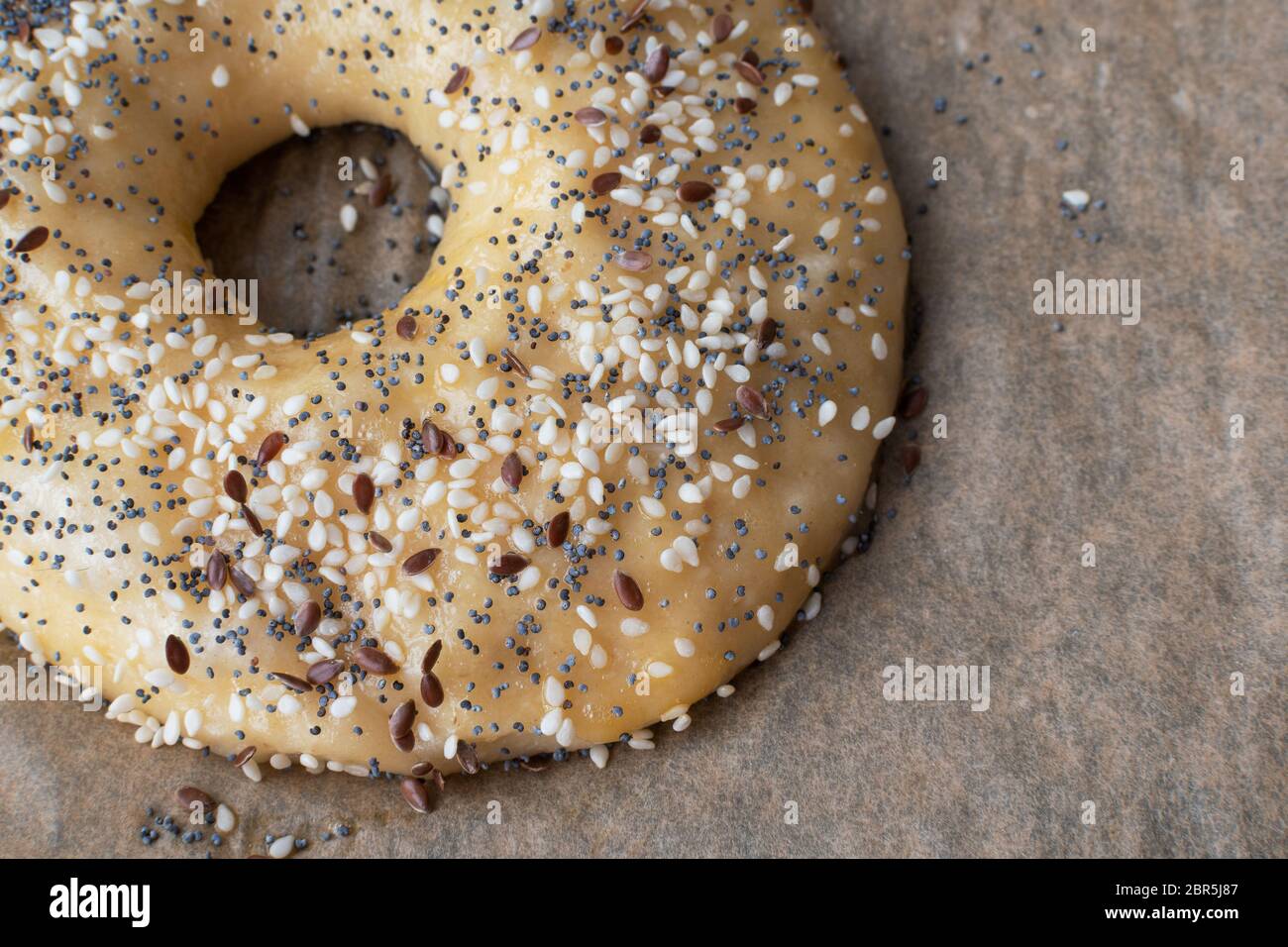 homemade preparation bagel with seeds Stock Photo - Alamy