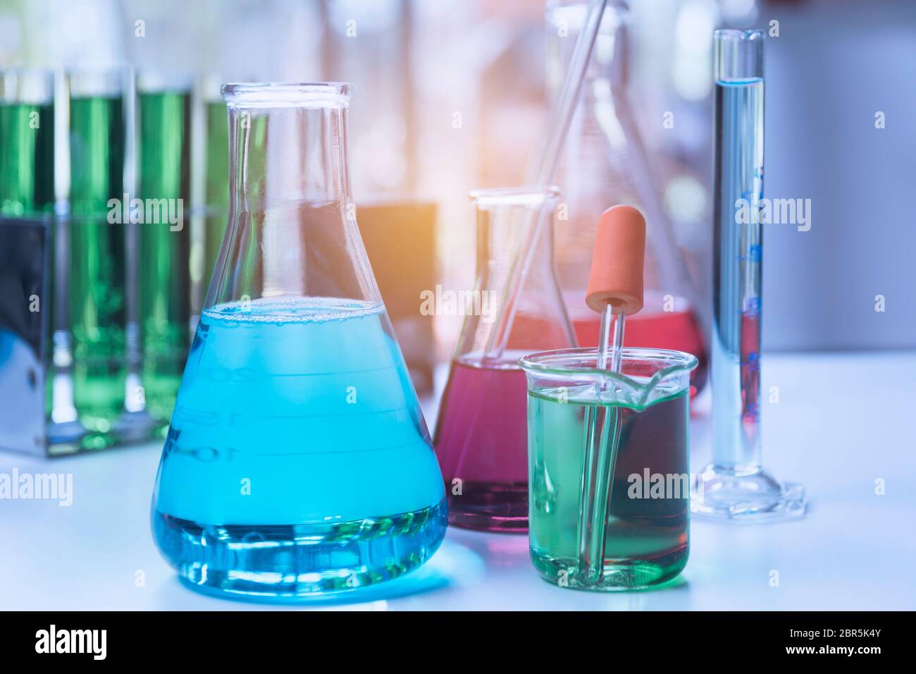 Glass laboratory chemical test tubes with liquid for analytical ...