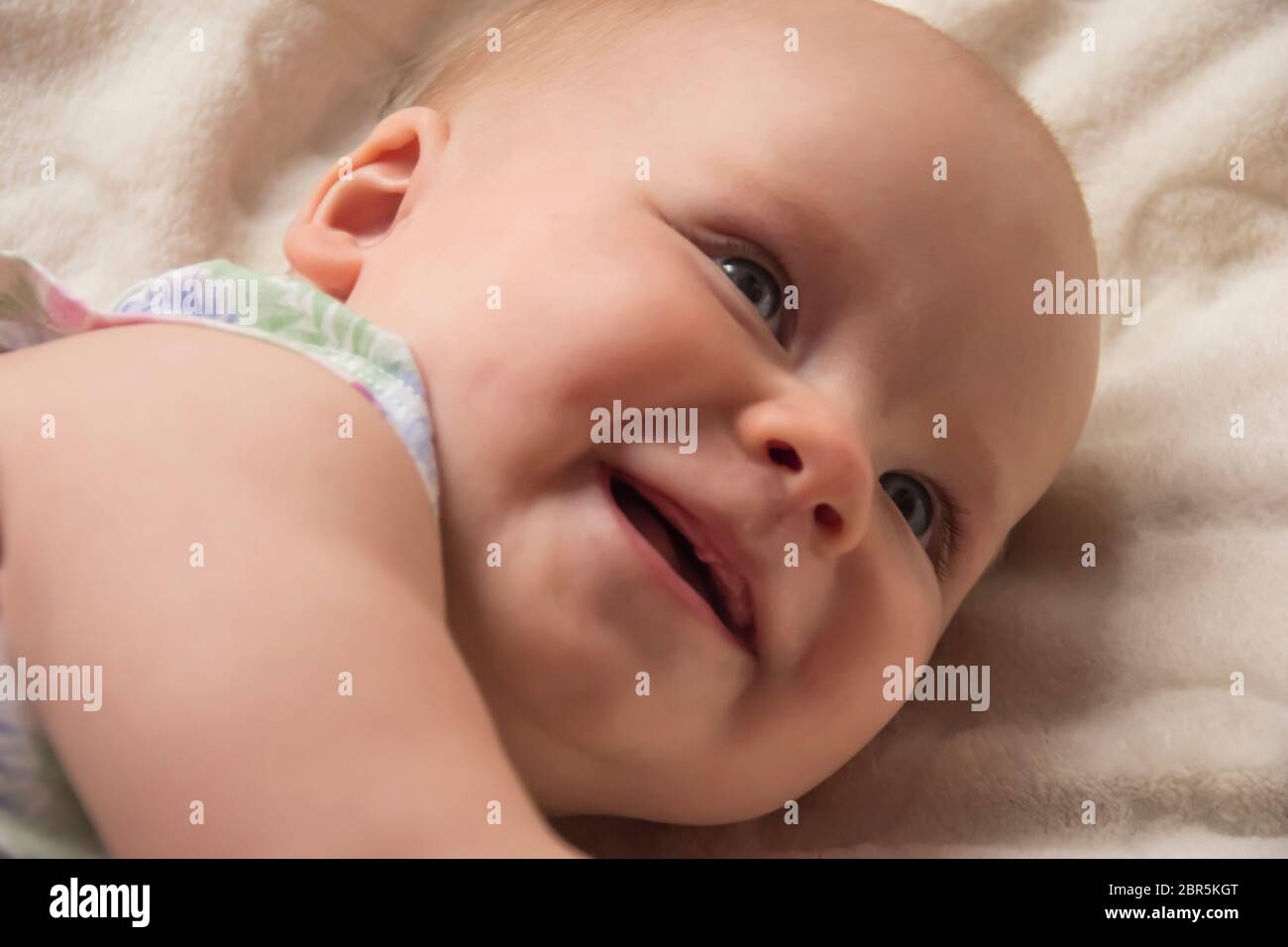 happy newborn, baby smiling close-up portrait photo. Beautiful picture ...