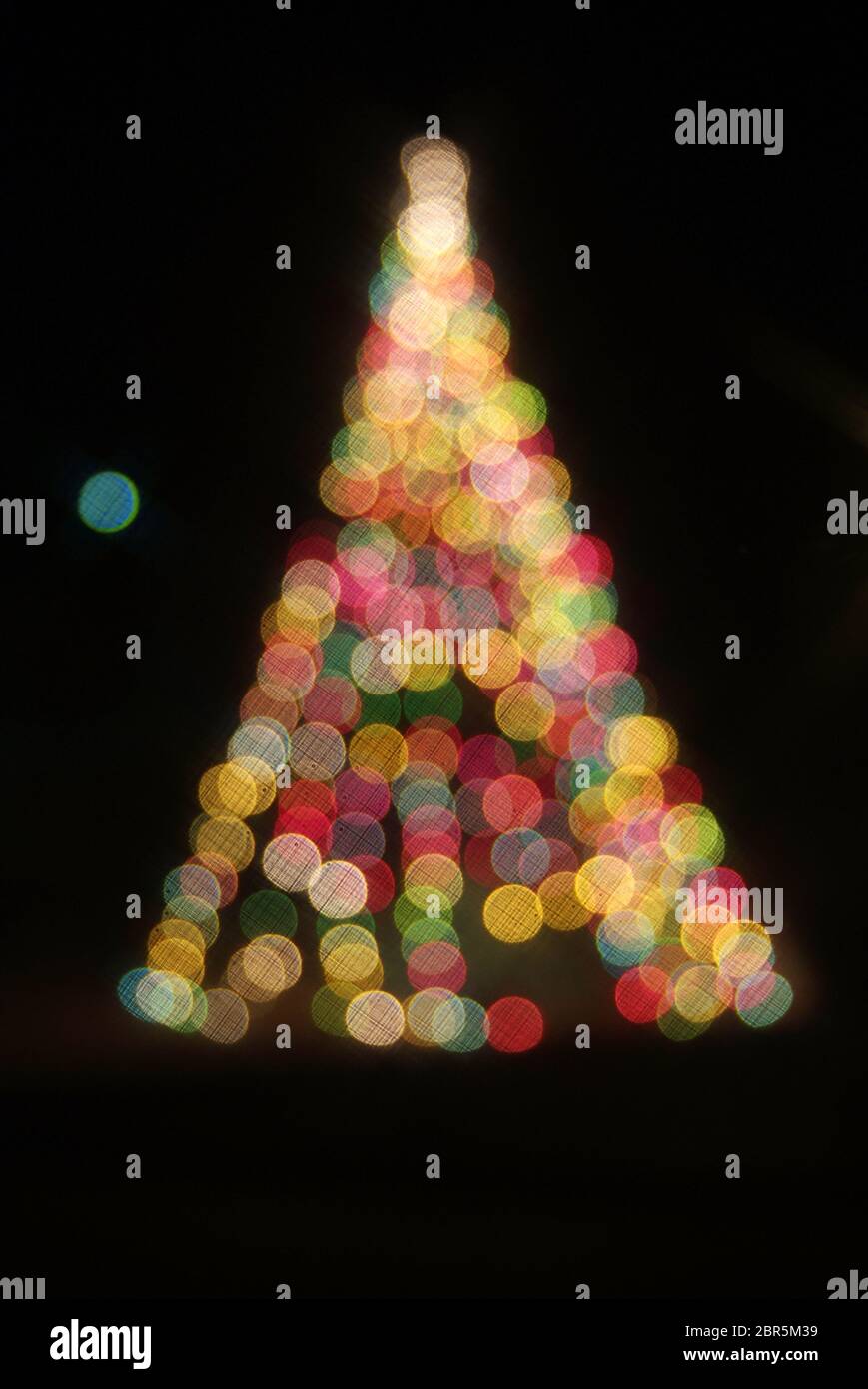 Christmas Tree with Multi Colored Lights at Night Stock Photo - Alamy