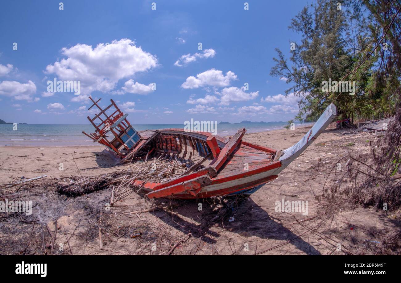 Storm damage. Fishing boat are damaged. Boat collapsed Stock Photo - Alamy