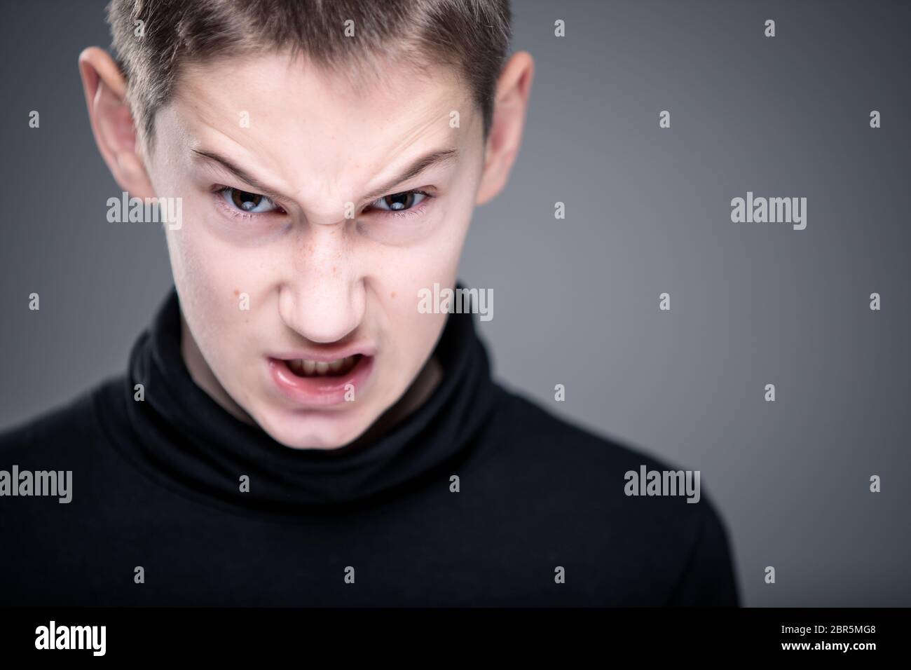 Loads of aggression in a little boy - education concept hinting ...