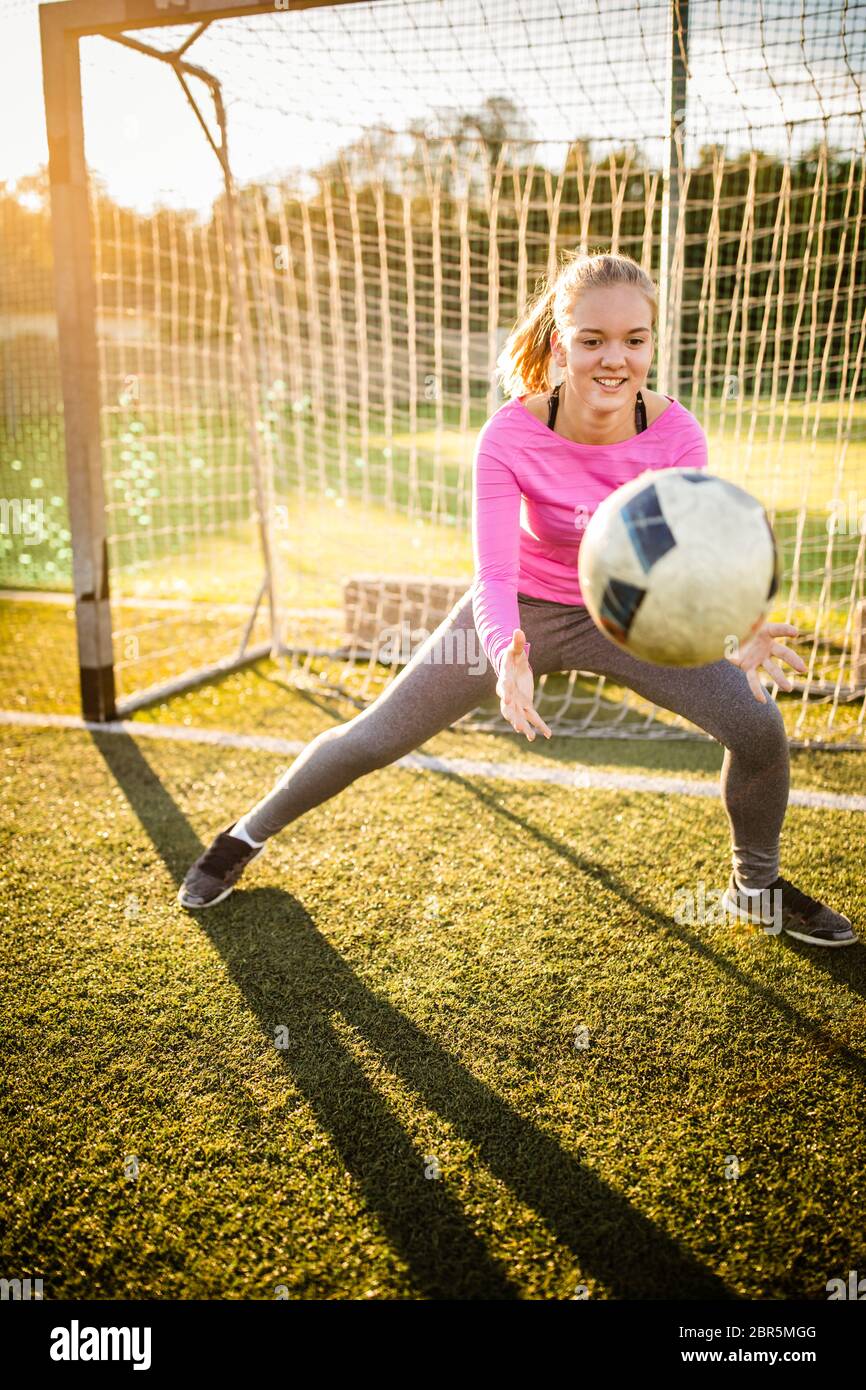 Teen girls playing soccer hi-res stock photography and images - Alamy