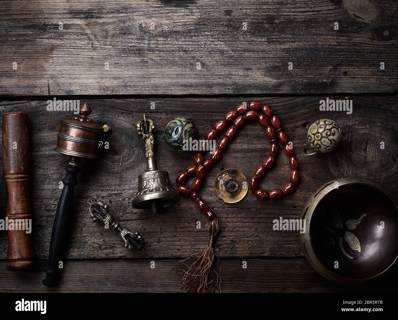 Copper singing bowl, prayer beads, prayer drum and other Tibetan ...