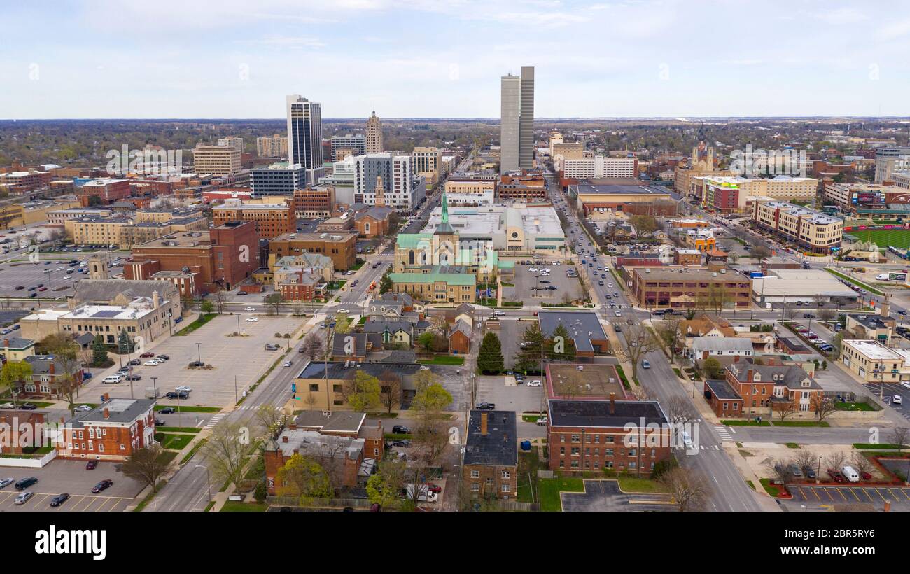 Colorful buildings businesses and churches line up by streets in this ...