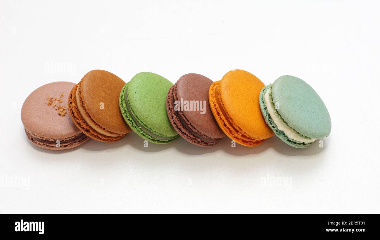 Six Macarons in Different Colors and Flavors Stock Photo - Alamy