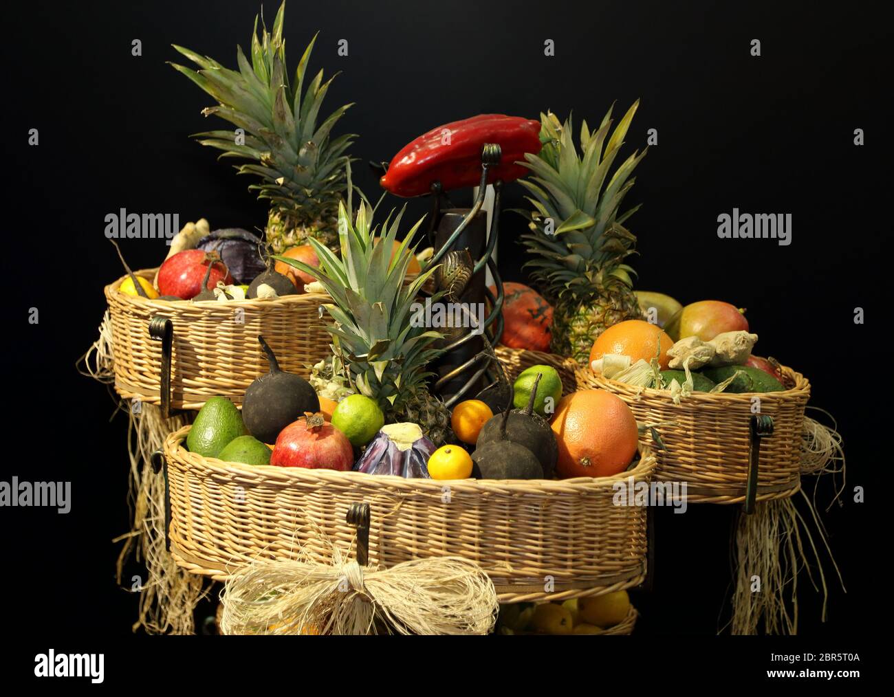 Fresh Fruits and Veggies in Decorative Rattan Baskets Stock Photo - Alamy