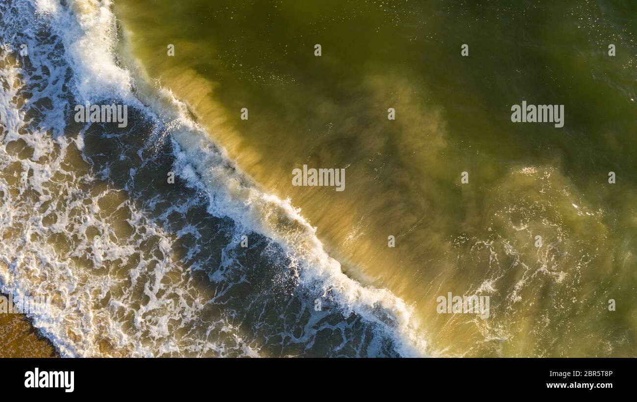 White caps roll in on top of ocean surf at Sandbridge Beach Stock Photo ...