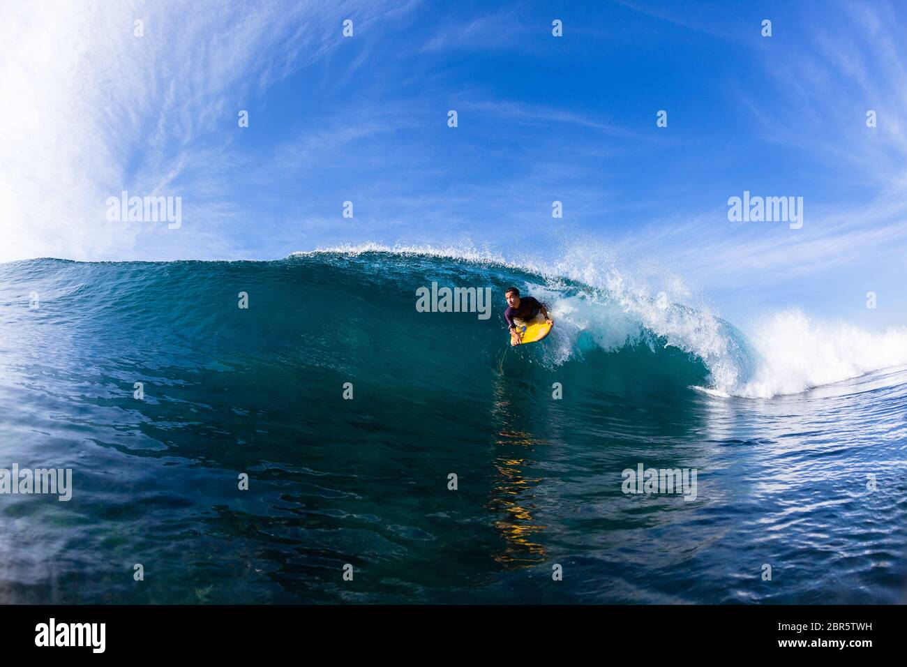 Surfing surfer body-boarder wipeout ride inside hollow ocean wave Stock ...