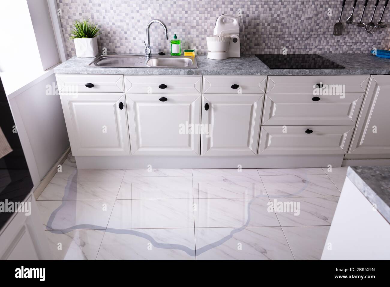 Water spill on floor hi-res stock photography and images - Alamy