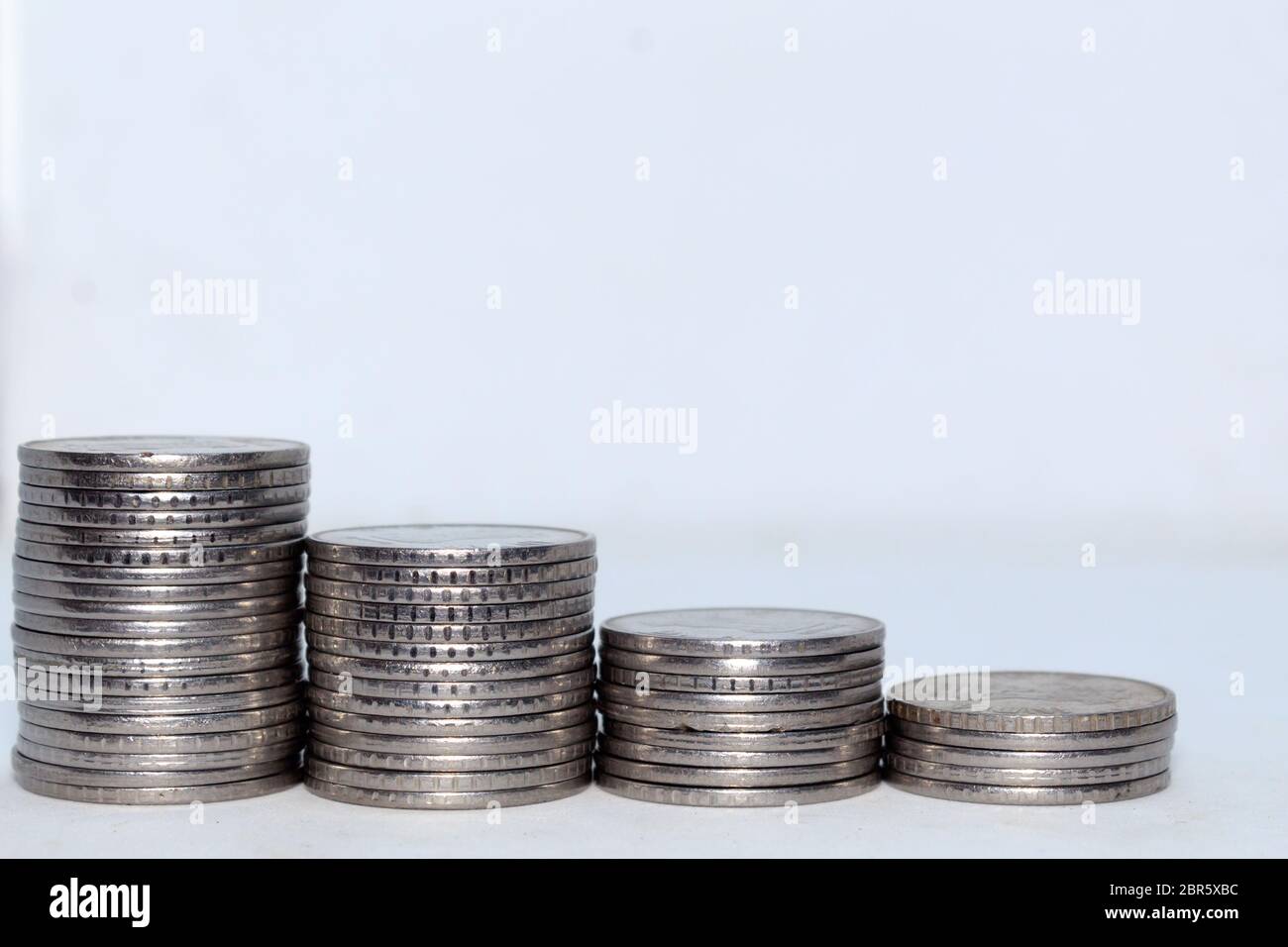 Stock pile 2 two Indian rupee metal coin currency on isolated white ...