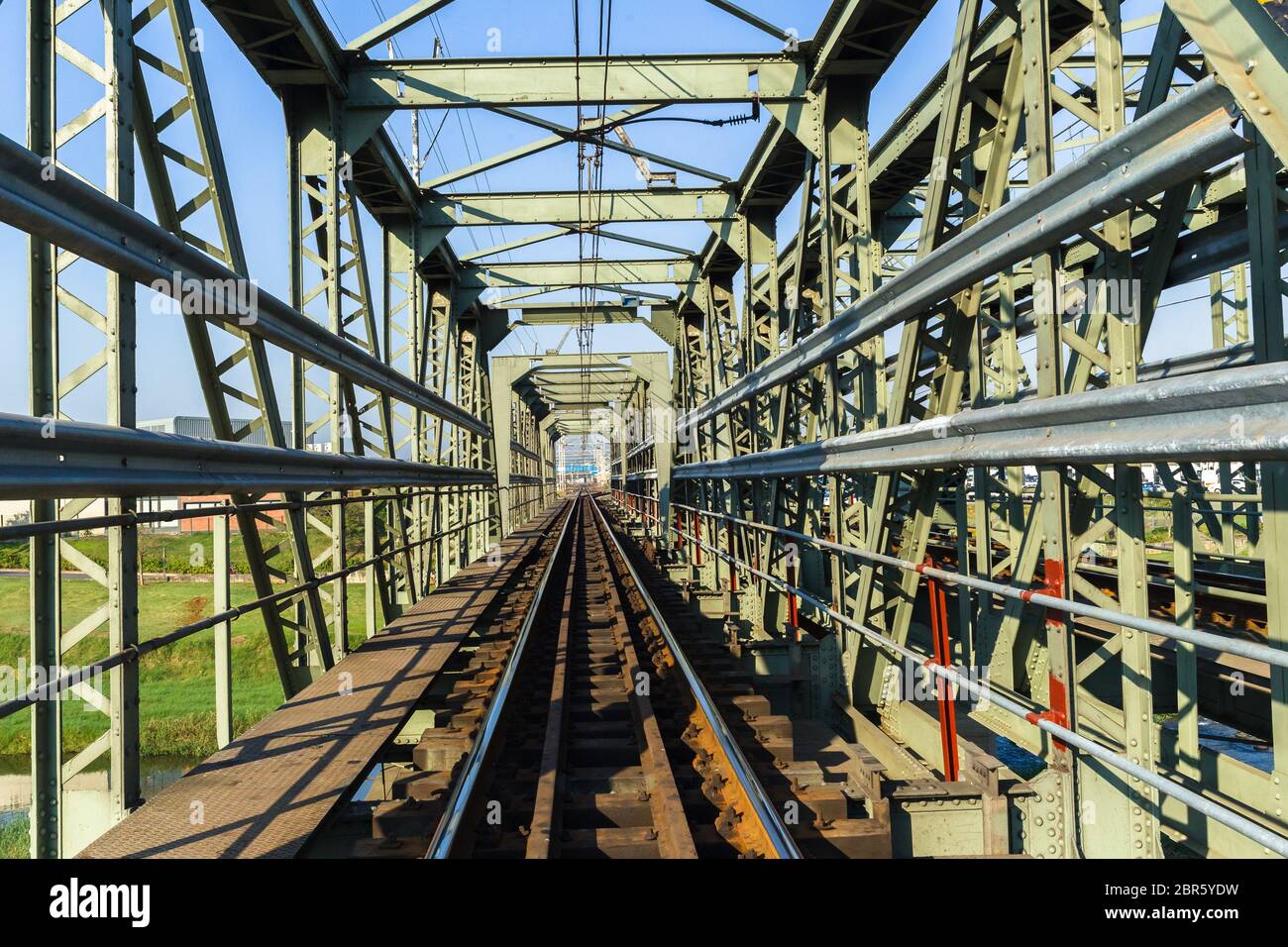 Tailway Train Bridge closeup inside on steel structure crossing Stock ...