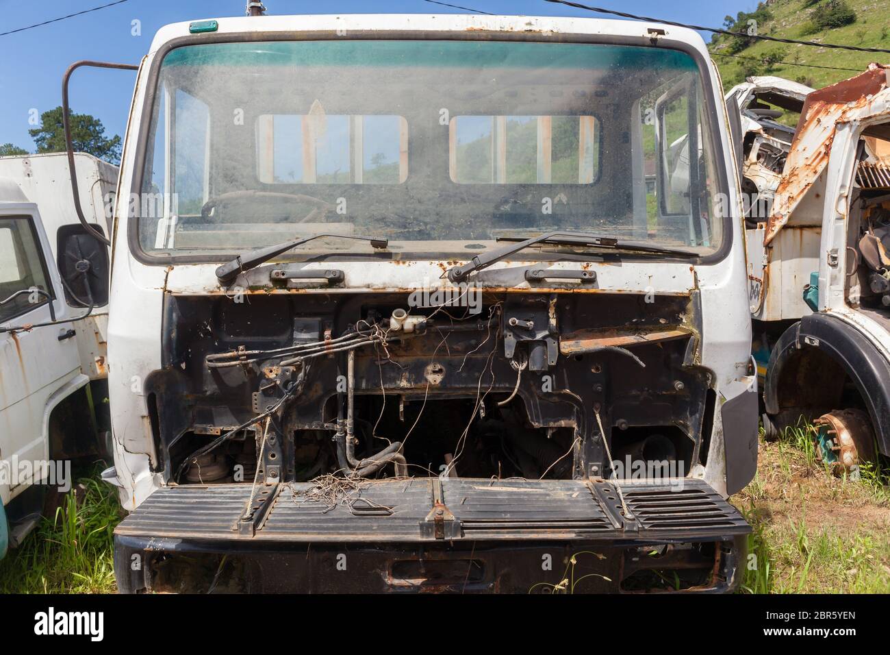 Trucks scrapped vehicles outdoors countryside Stock Photo - Alamy