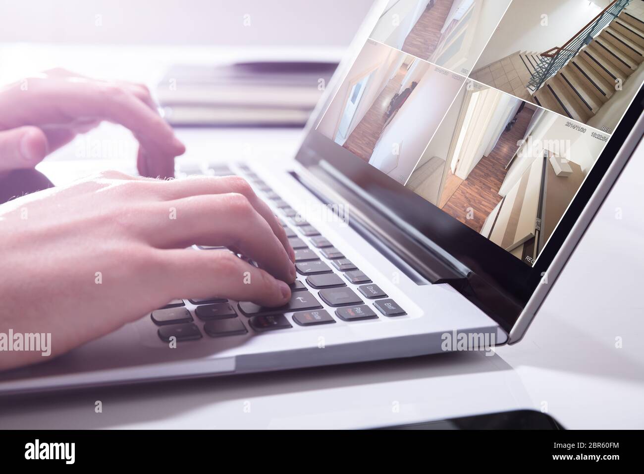 Close-up Of A Businessman's Hand Monitoring CCTV Camera Footage On ...