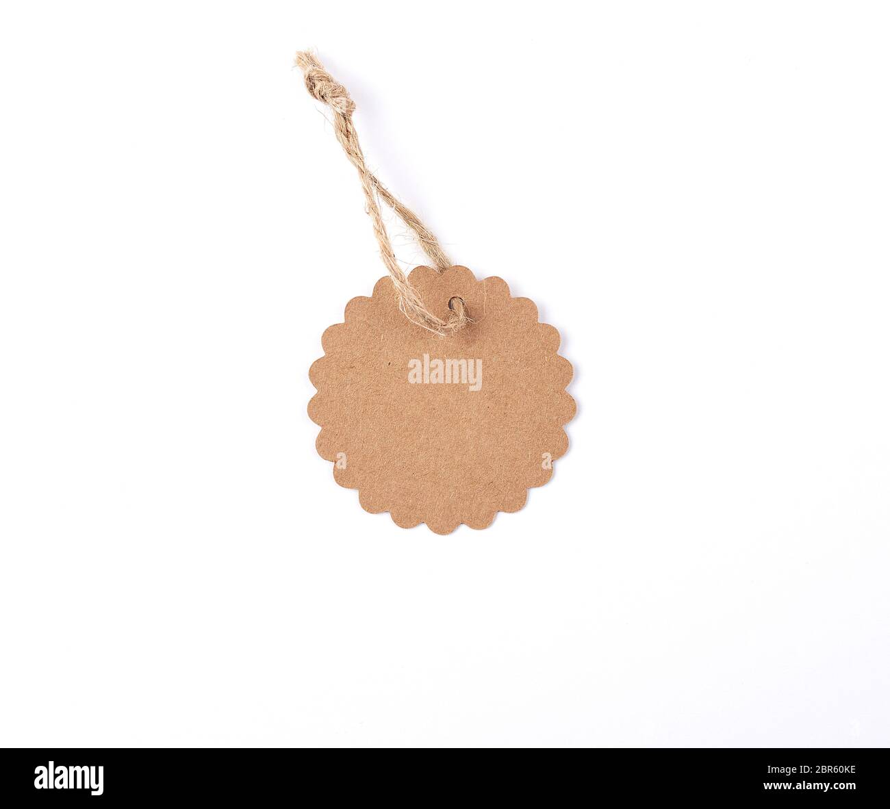 empty paper round brown tag on a rope, white background, sales concept ...