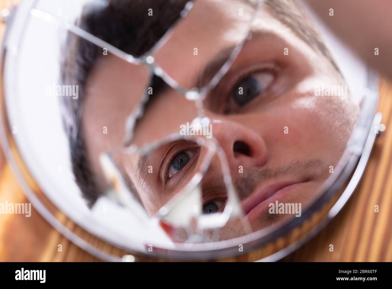 Shattered mirror man hi-res stock photography and images - Alamy