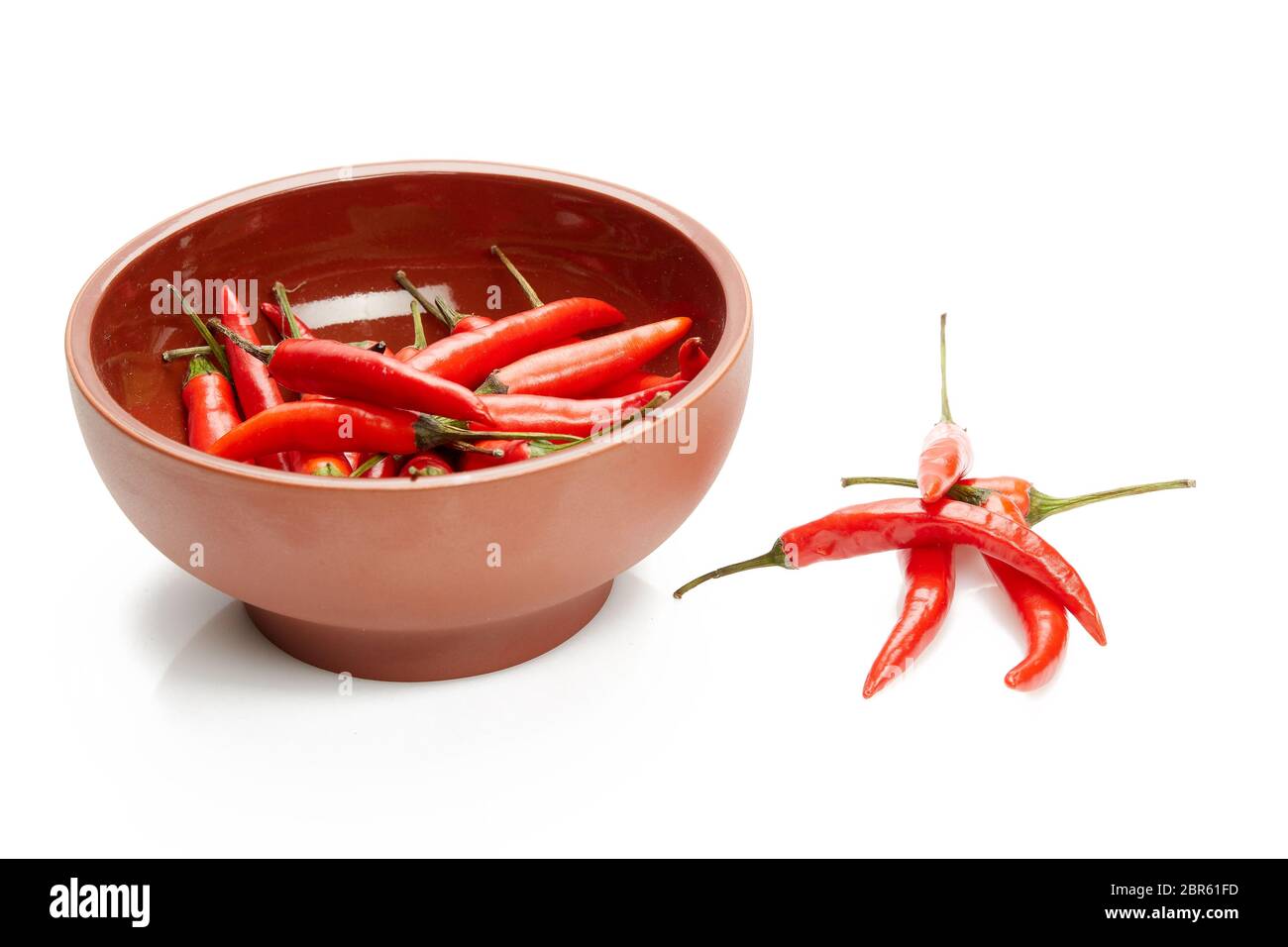 Red hot chili peppers in a bowl isolated on a white background Stock ...