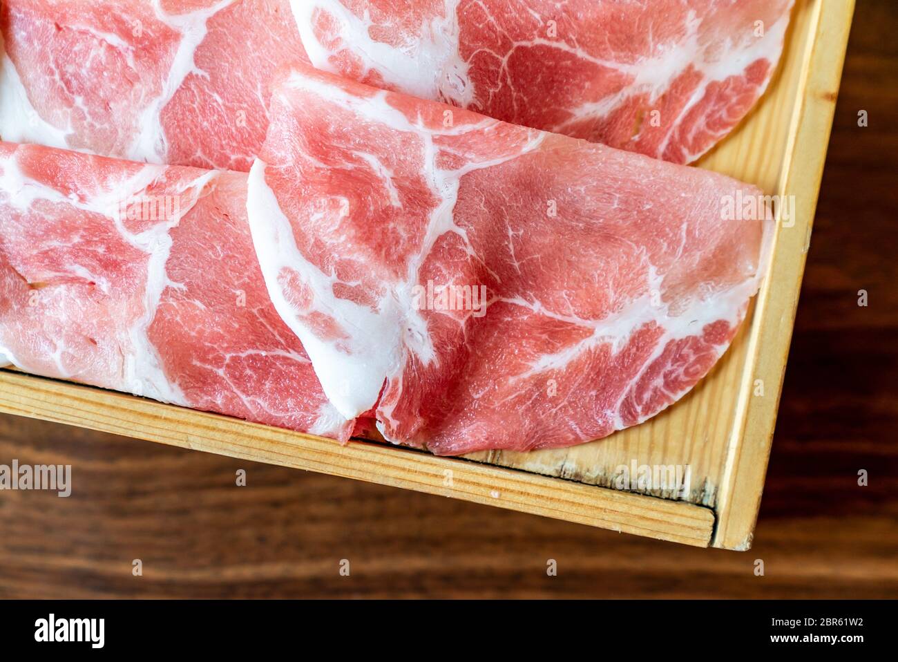 Raw Kurobuta pork meat set ready to cook Shabu shabu and sukiyaki Stock ...