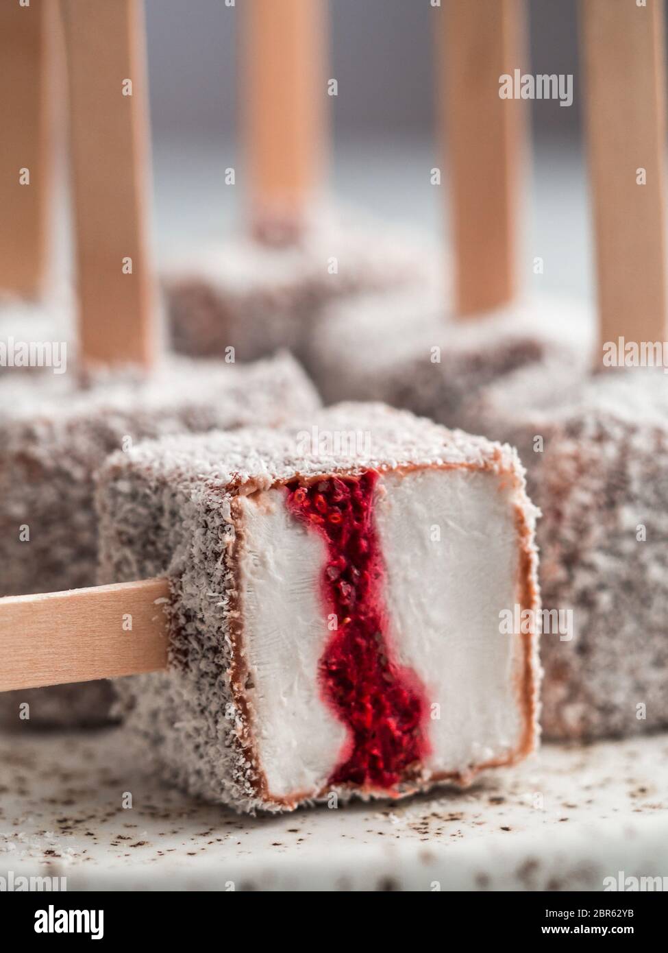 Homemade raw lamington ice cream pops on light background. Australian ...