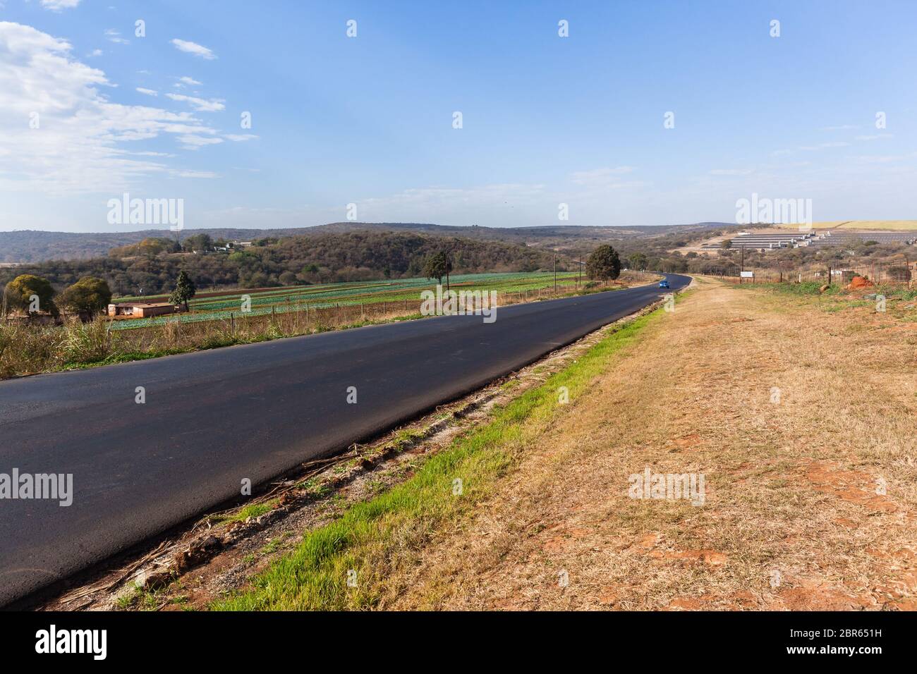 Farming countryside road with vegetatable and chicken farm agriculture ...