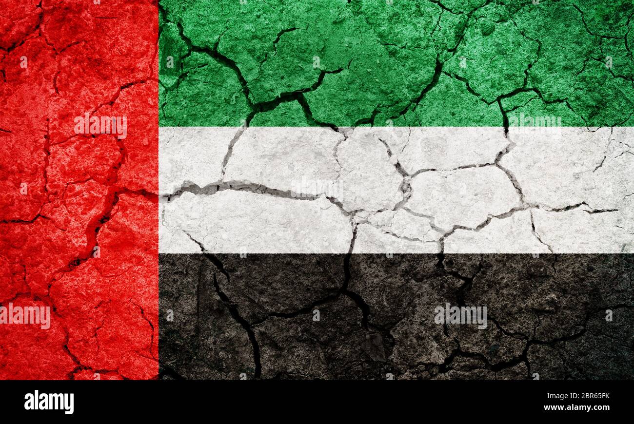 United Arab Emirates flag on dry earth ground texture background Stock ...
